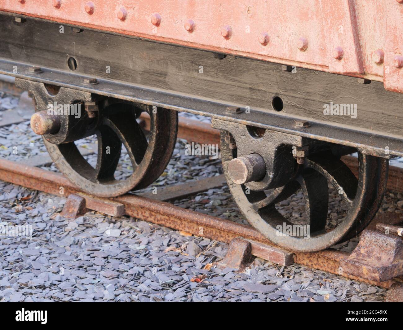 Closeup of metal train wheels on the track during daylight Stock Photo ...
