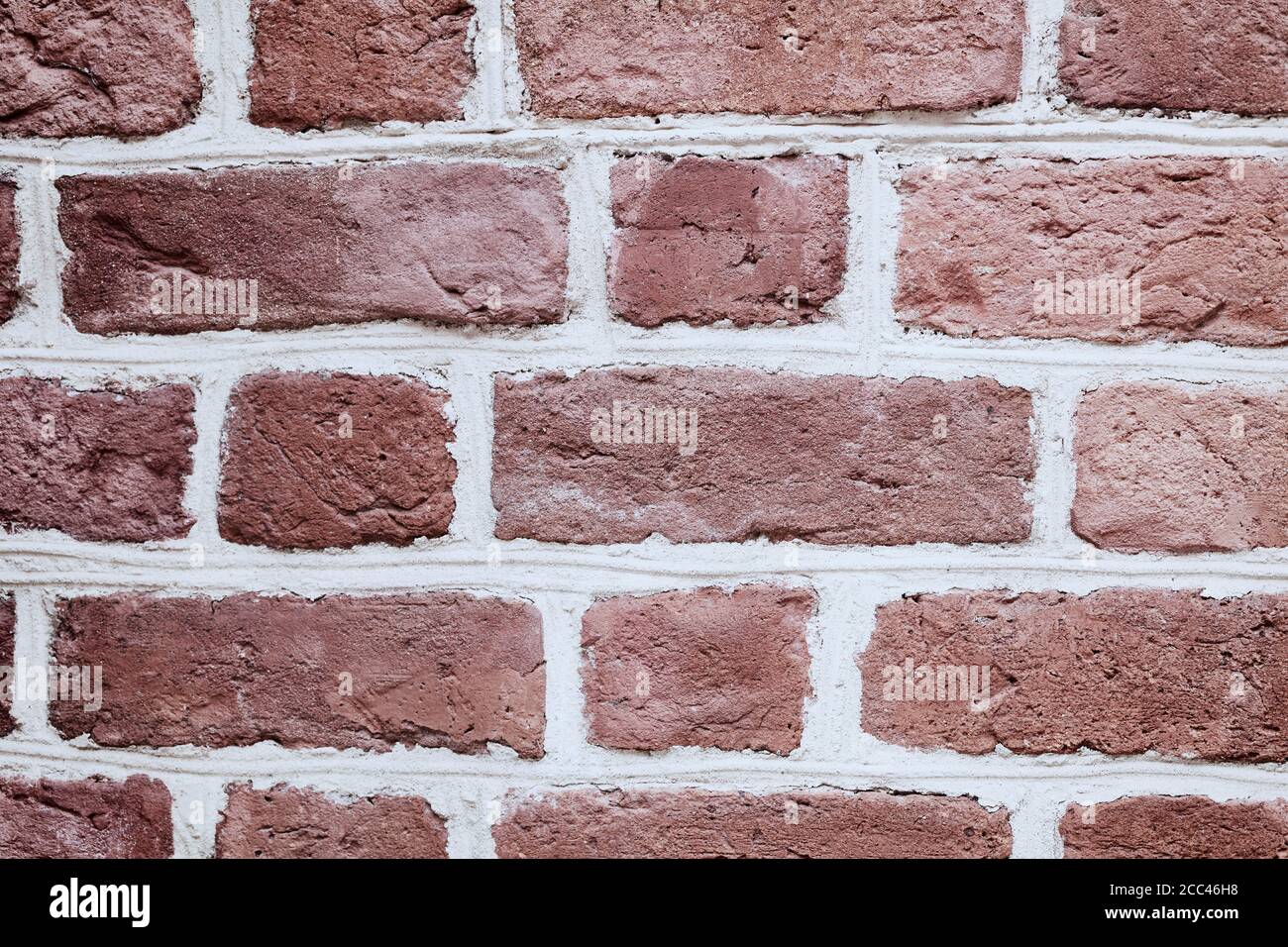 Background of old brick wall. Front view Stock Photo - Alamy
