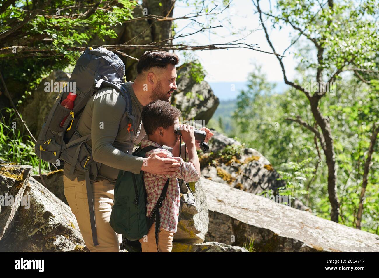 African boy climbing tree hi-res stock photography and images - Alamy