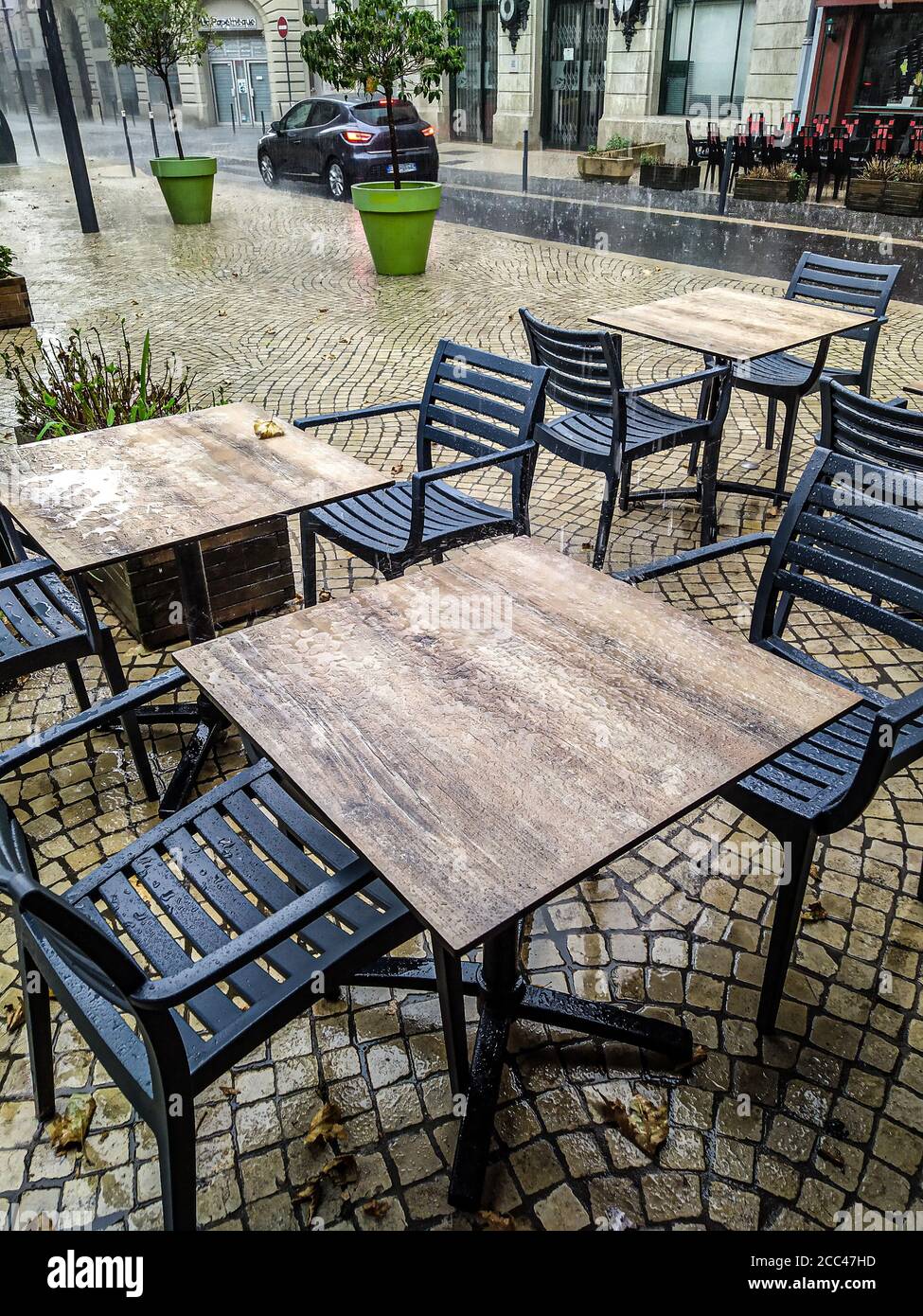 restaurant terrace in the rain Stock Photo - Alamy