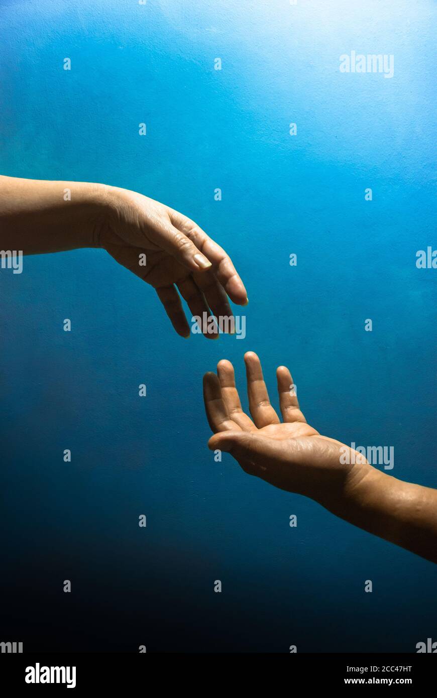 Two hands almost touching hi-res stock photography and images - Alamy