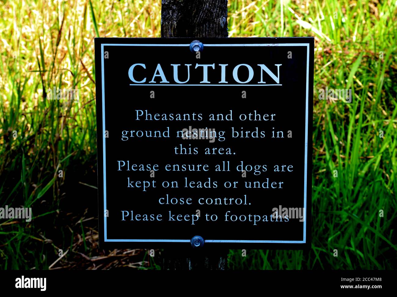 Birds nesting sign at a country estate Stock Photo - Alamy