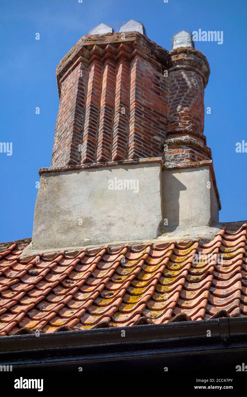 chimney stack, with linked lozenge-shaped shafts, decorative brickwork ...