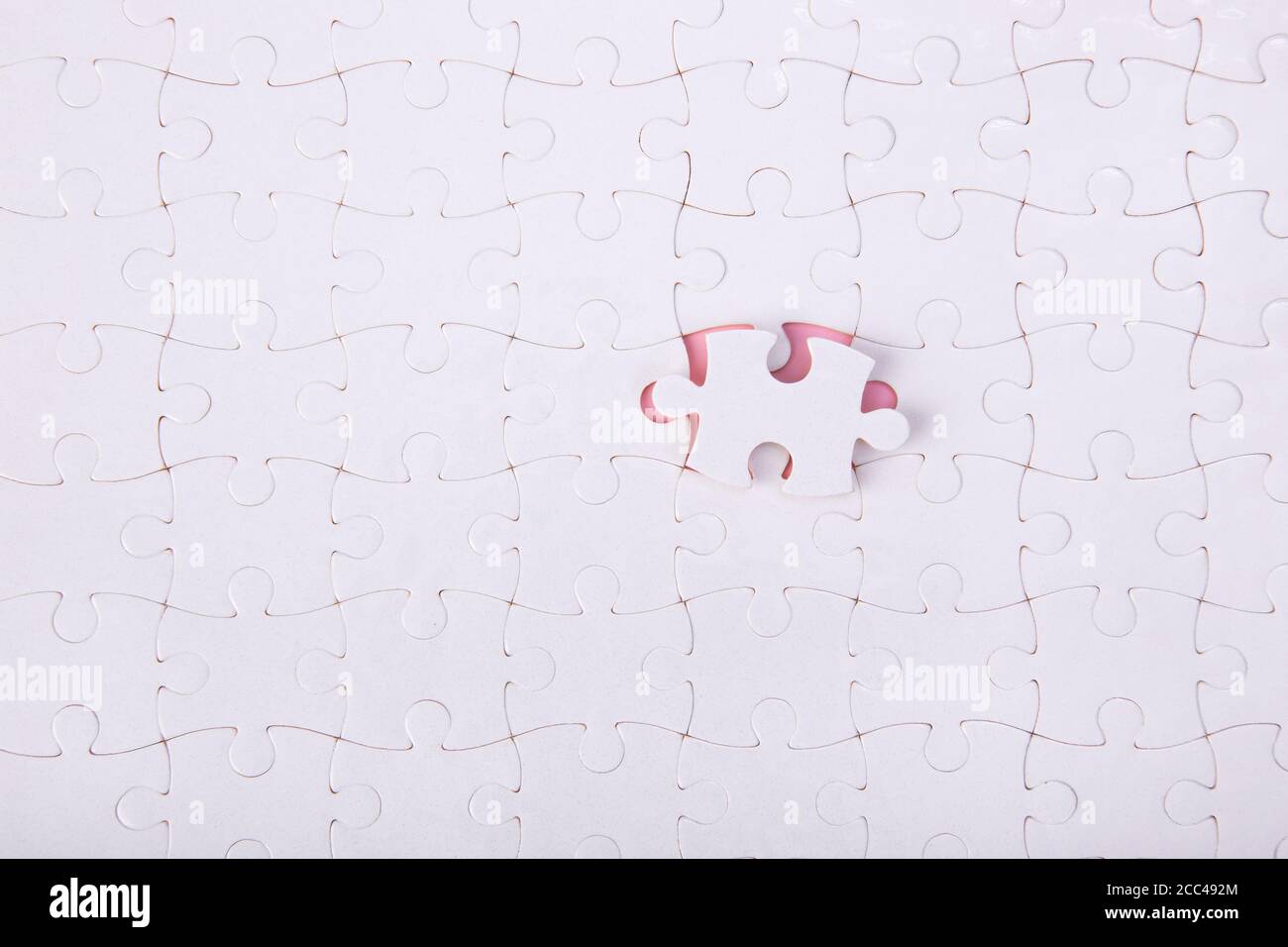 Partially completed jigsaw puzzle High Resolution Stock Photography and ...