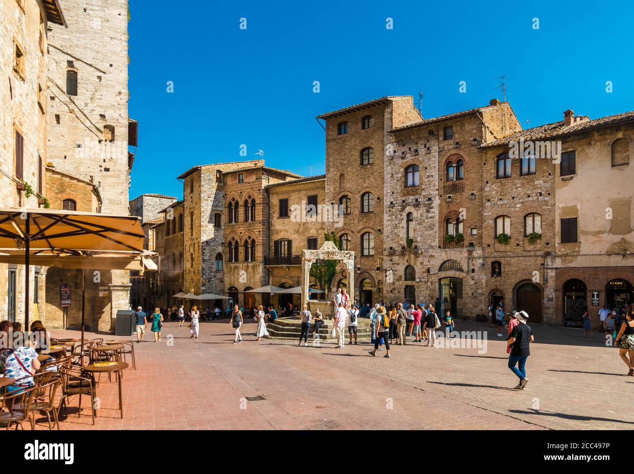 Lovely view of the popular Piazza della Cisterna, the main square of ...
