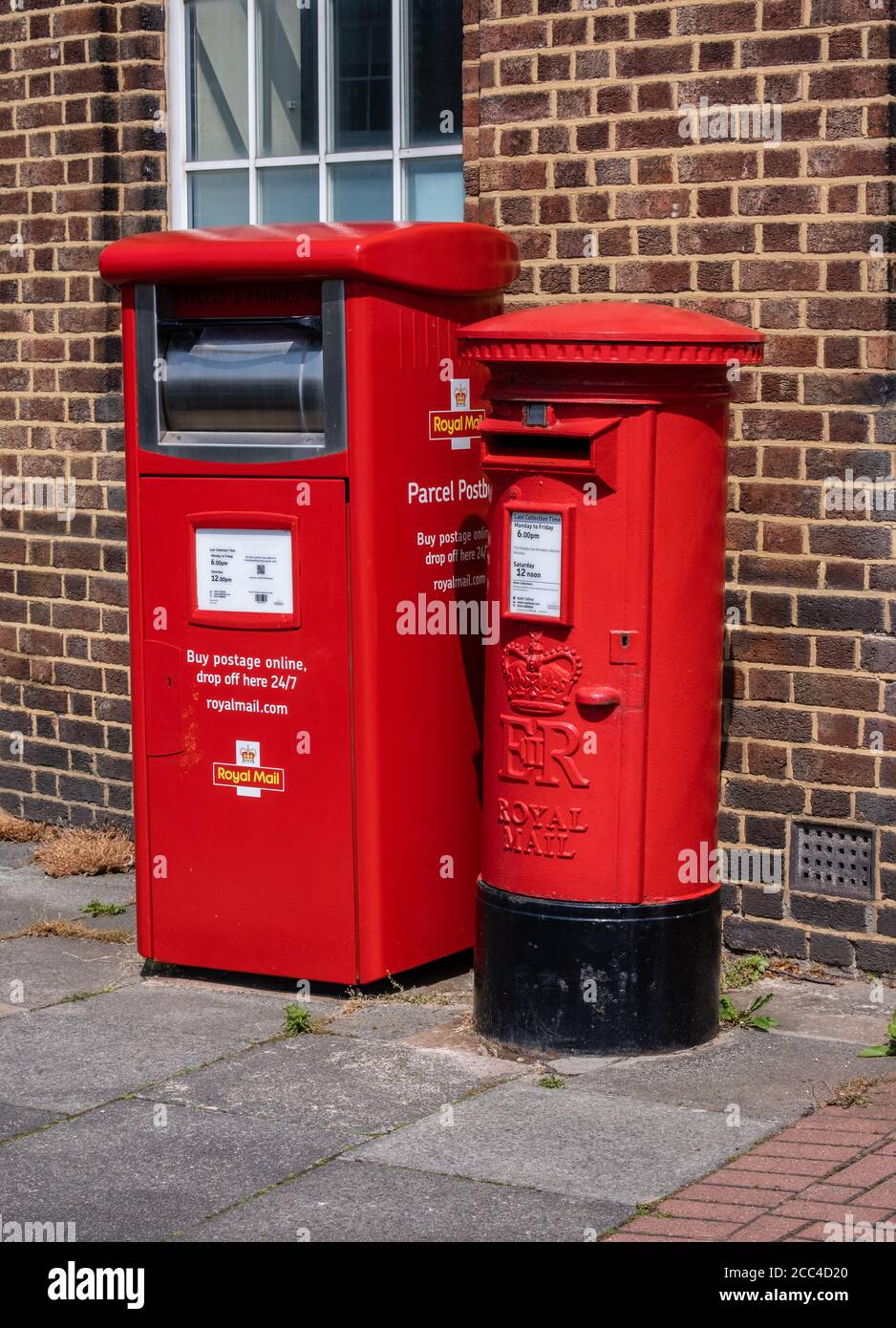 Red postbox and adjacent parcel postbox in Hoylake Wirral June 2020 ...