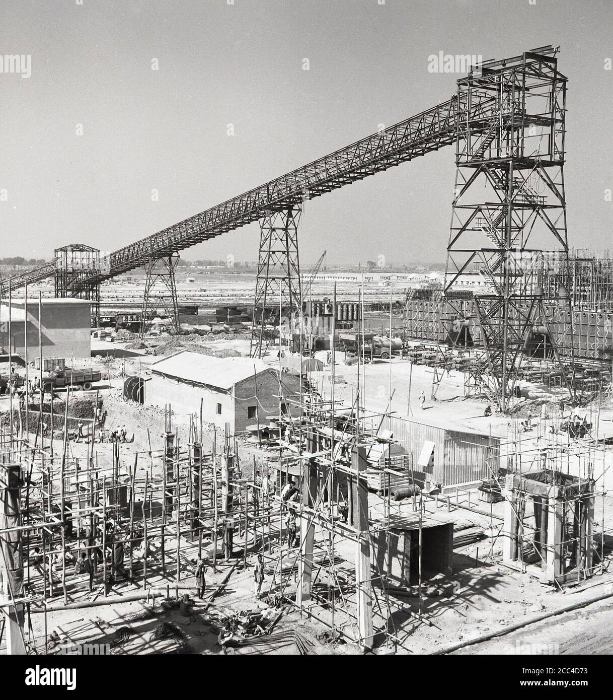 1960s, historical, large industrial construction site, Delhi, India ...