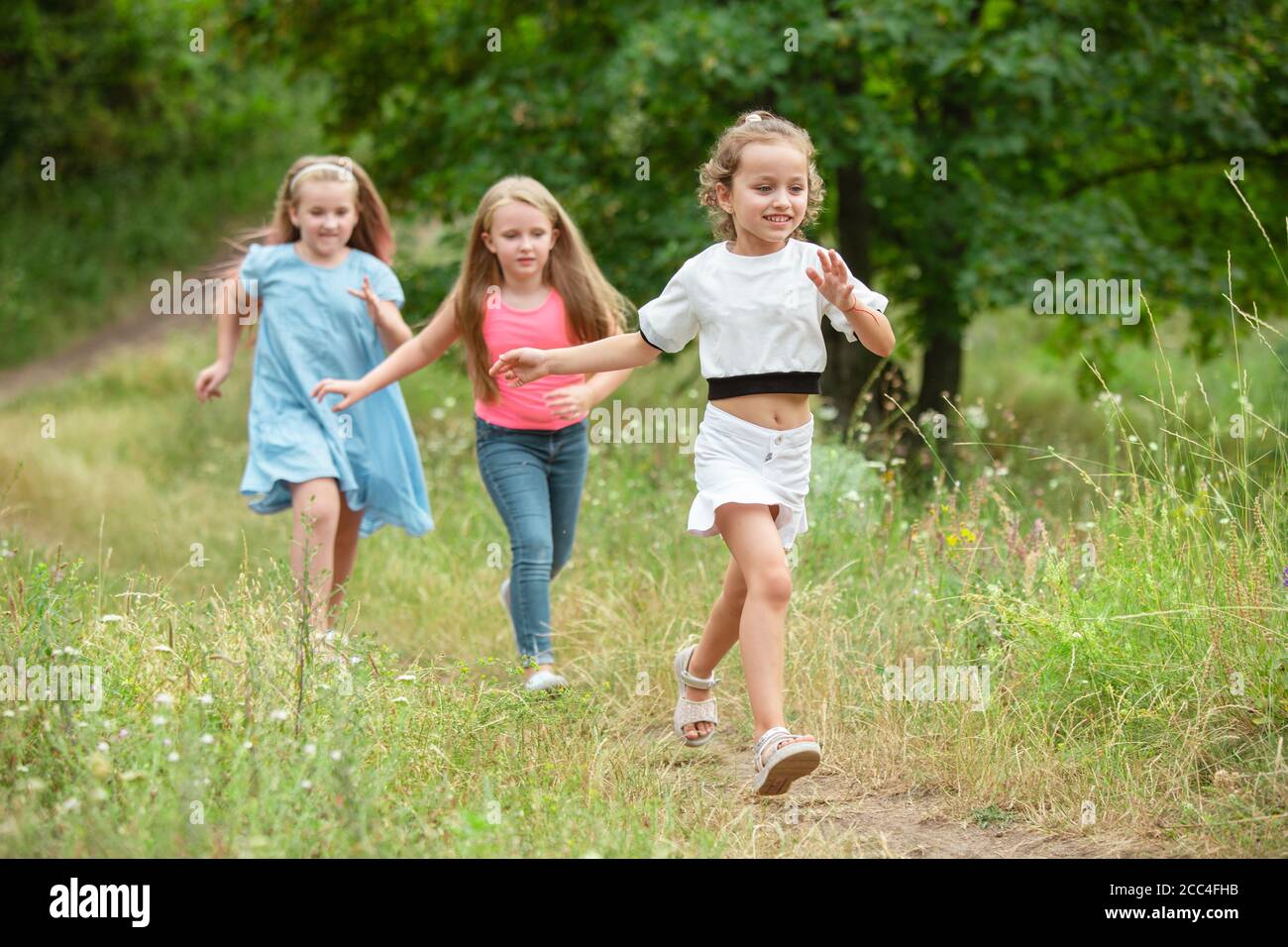 Memories. Kids, children running on green forest. Cheerful and happy ...