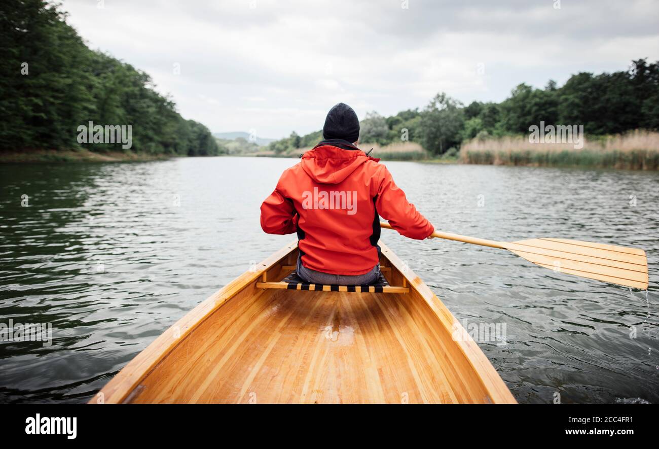 Rear man paddling boat hi-res stock photography and images - Alamy