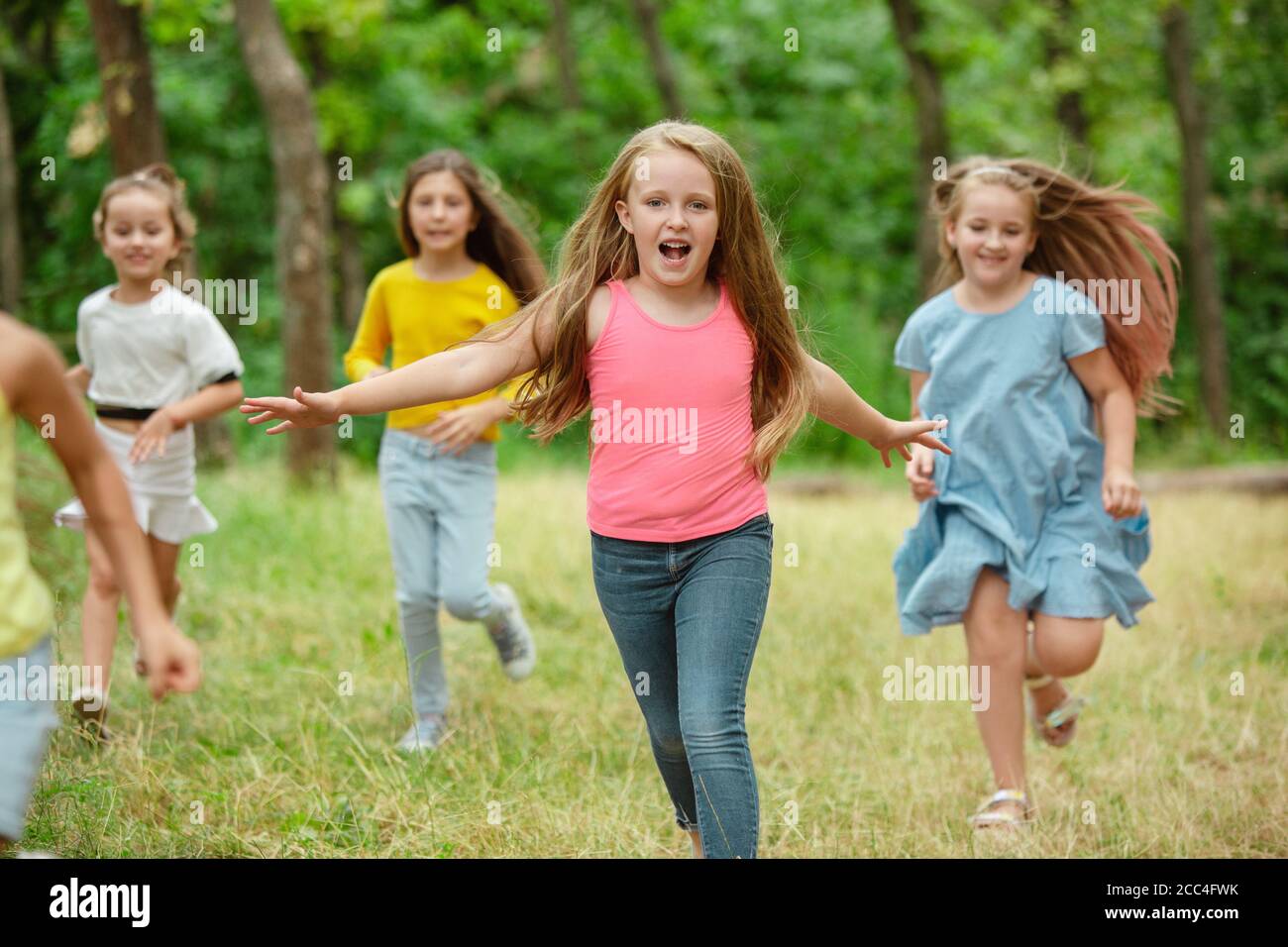 Memories. Kids, children running on green forest. Cheerful and happy ...