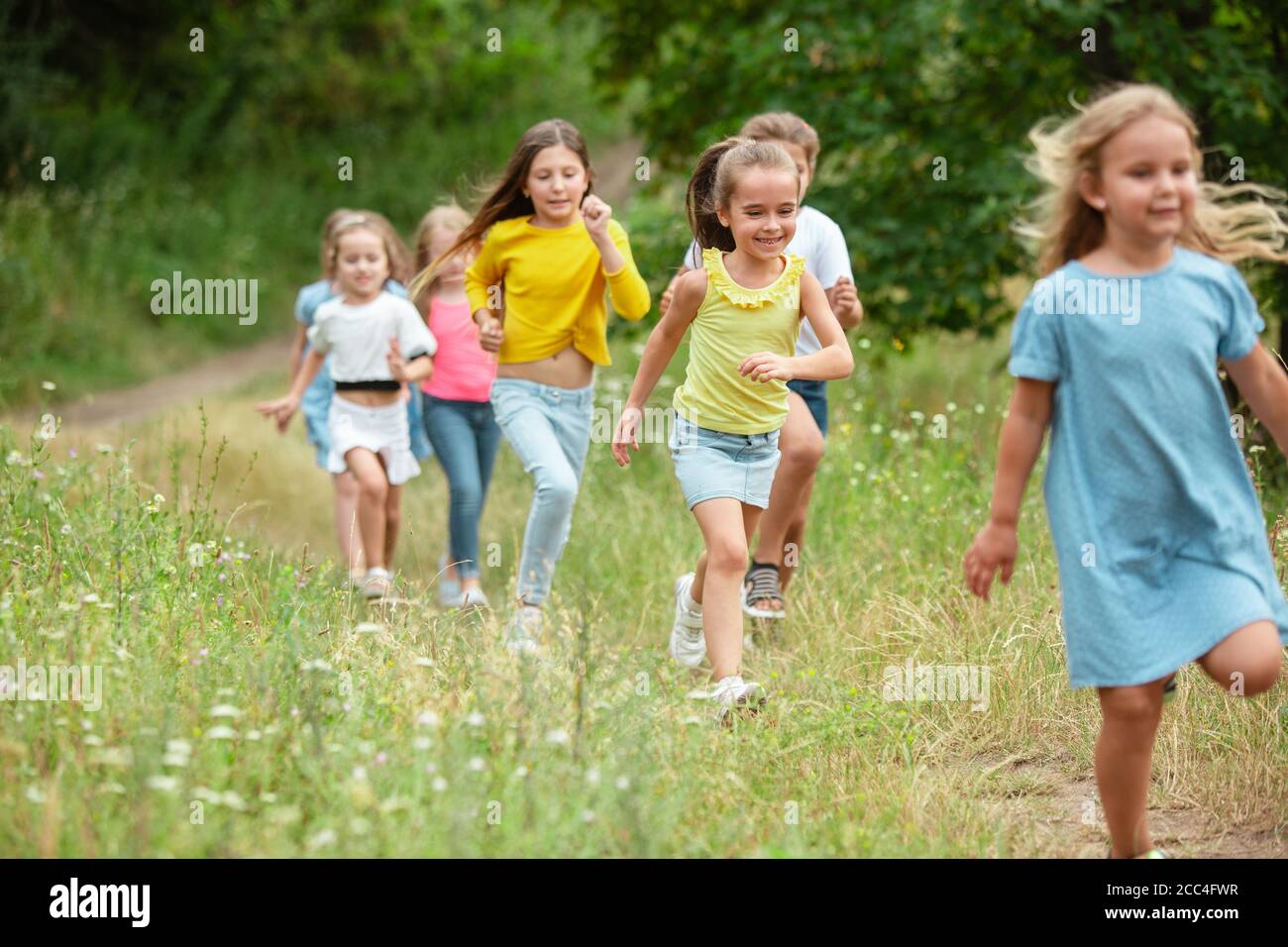 Memories. Kids, children running on green forest. Cheerful and happy ...