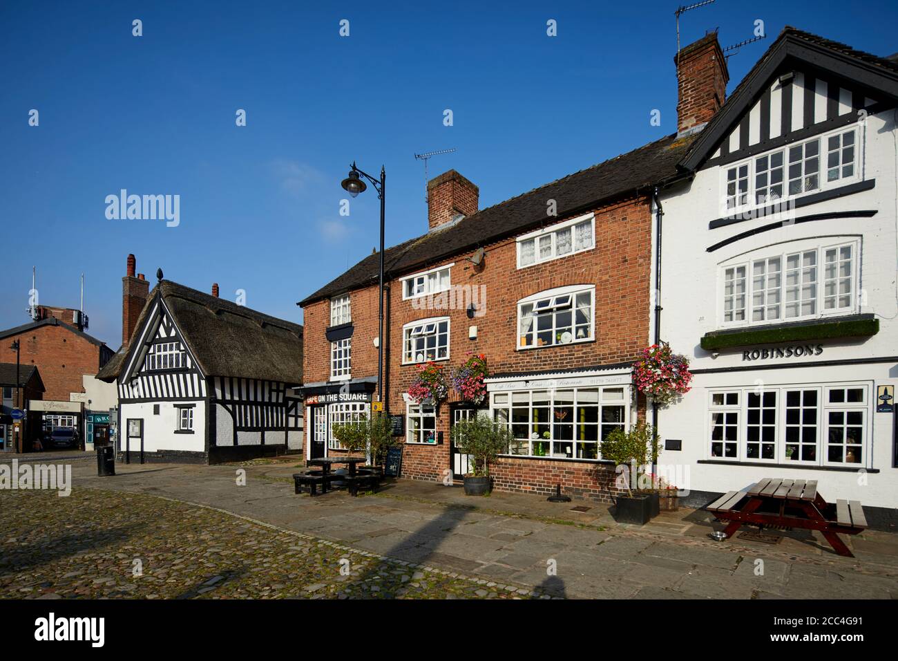 Restaurant and stores on the market square hi-res stock photography and ...