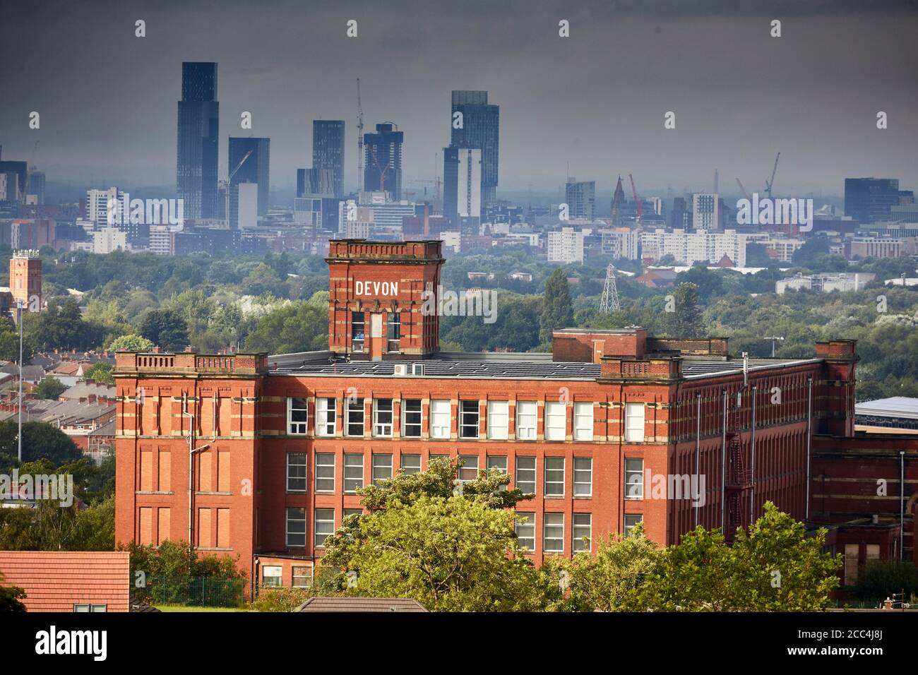 Grade II listed large red brick textile Devon Mill in Oldham with the ...