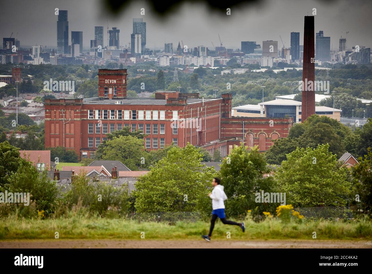Grade II listed large red brick textile Devon Mill in Oldham with the ...