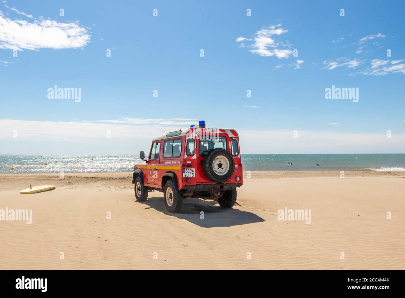 red Coastguard Land Rover defender at place Napoleon beach in the ...