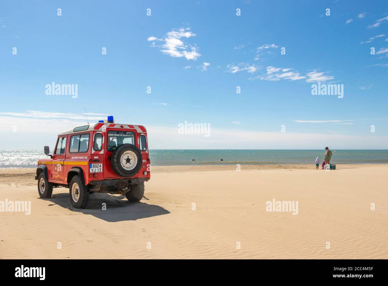 red Coastguard Land Rover defender at place Napoleon beach in the ...
