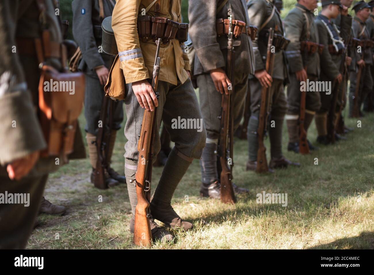 Detail of a rifle held by a soldier. Rifle and uniform from the First ...