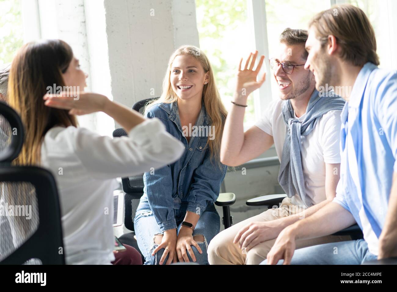 Management team high five in hi-res stock photography and images - Alamy