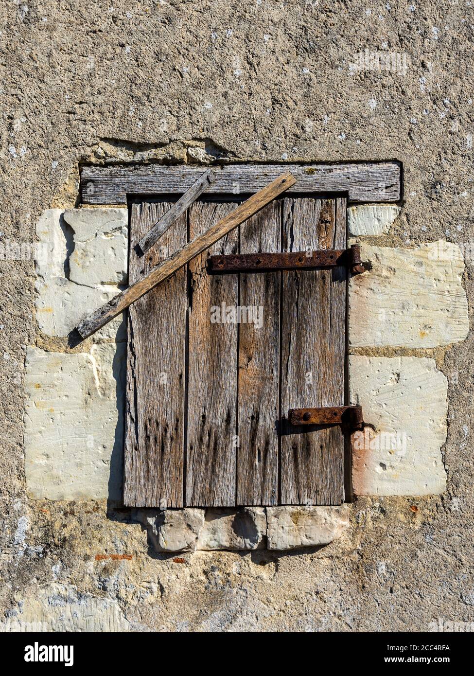 Old weathered wooden door closed with added nailed battens Stock Photo ...