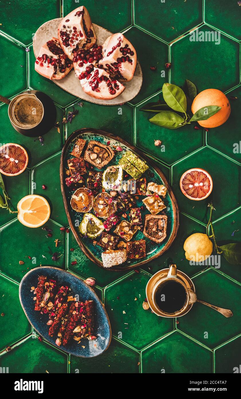 Turkish traditional lokum with coffee over green tile table Stock Photo ...