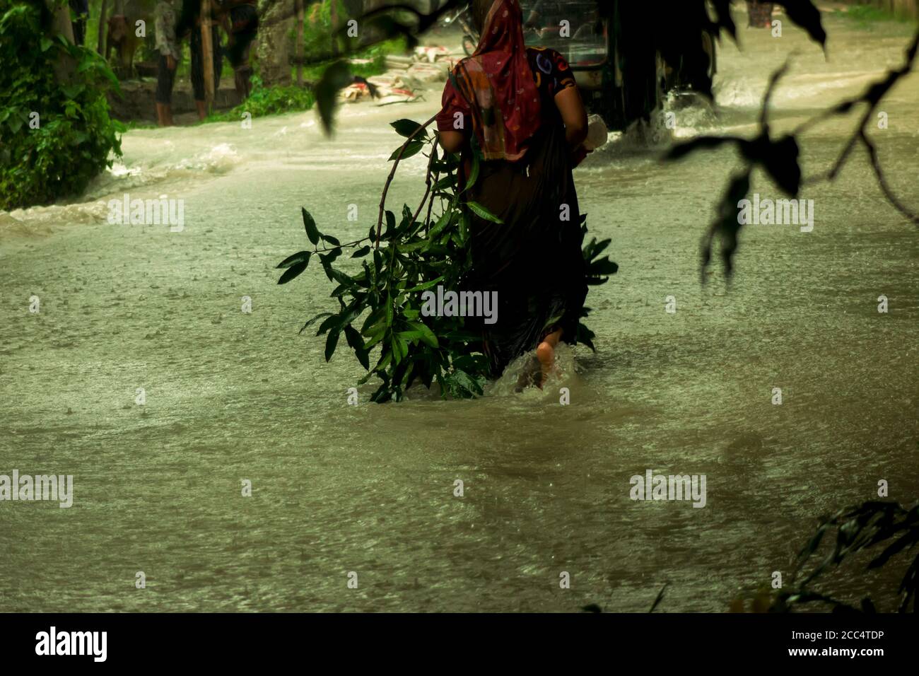 The rain falls, the drops fall on her body Stock Photo - Alamy