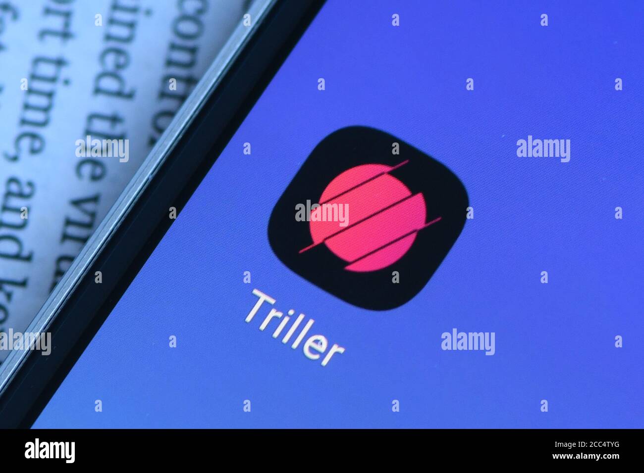 In this photo illustration a Triller logo is seen displayed on a ...