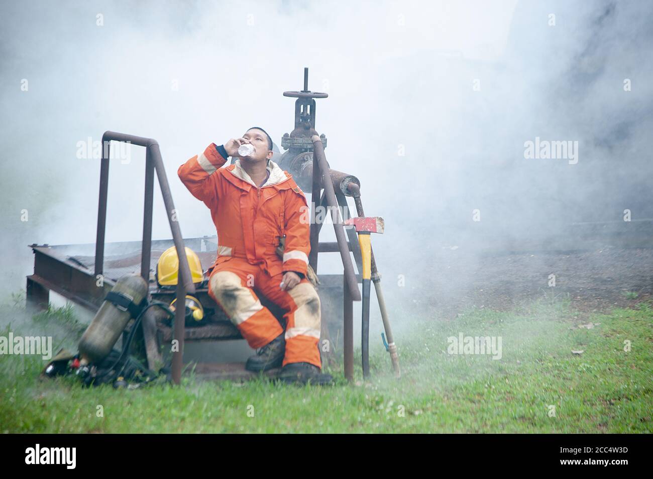 Firefighter rest after rescue hi-res stock photography and images - Alamy
