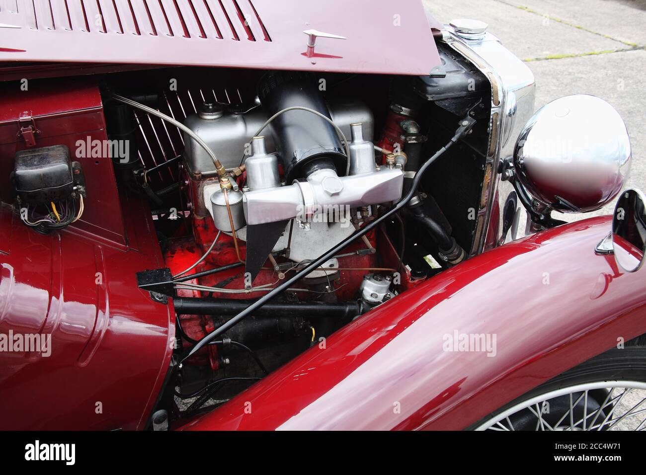 Old red vintage classic collectors car engine that has been restored ...