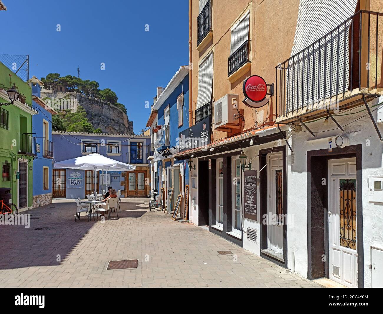 Denia, Spain - June 18, 2020: Charming street and Denia castle view ...