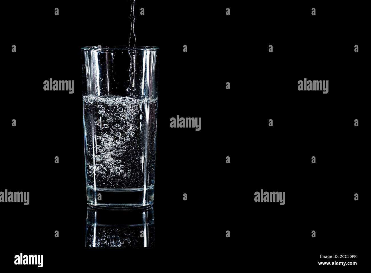 Glass Of Water Black Background