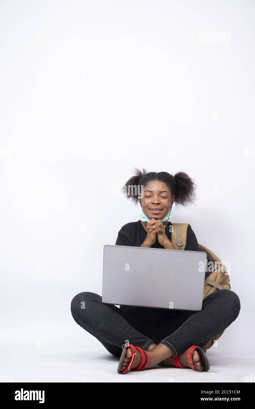 African Woman Sitting Hands On Legs High Resolution Stock Photography ...