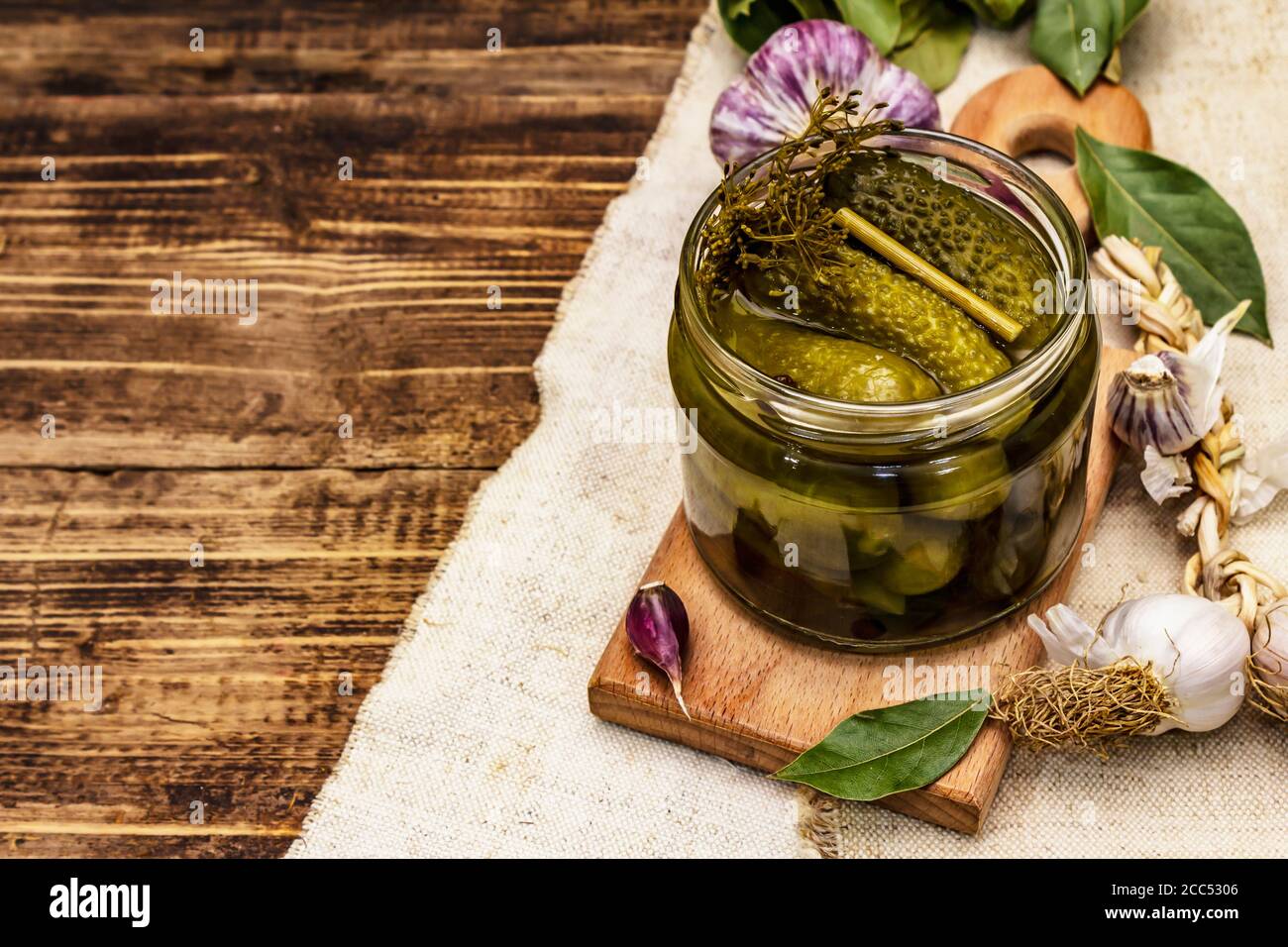 Marinated pickled cucumbers with spices and herbs. Traditional ...
