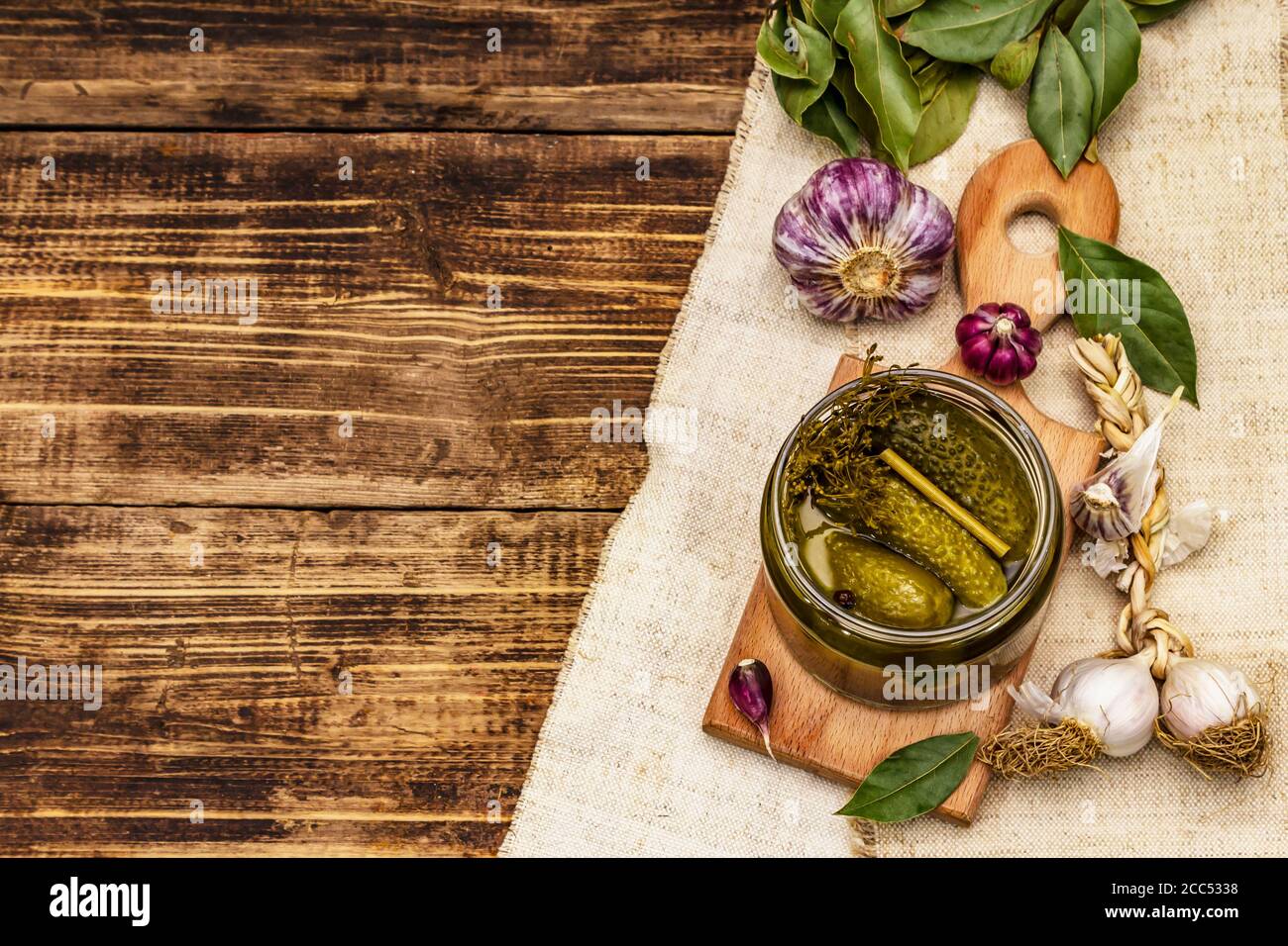 Marinated pickled cucumbers with spices and herbs. Traditional ...