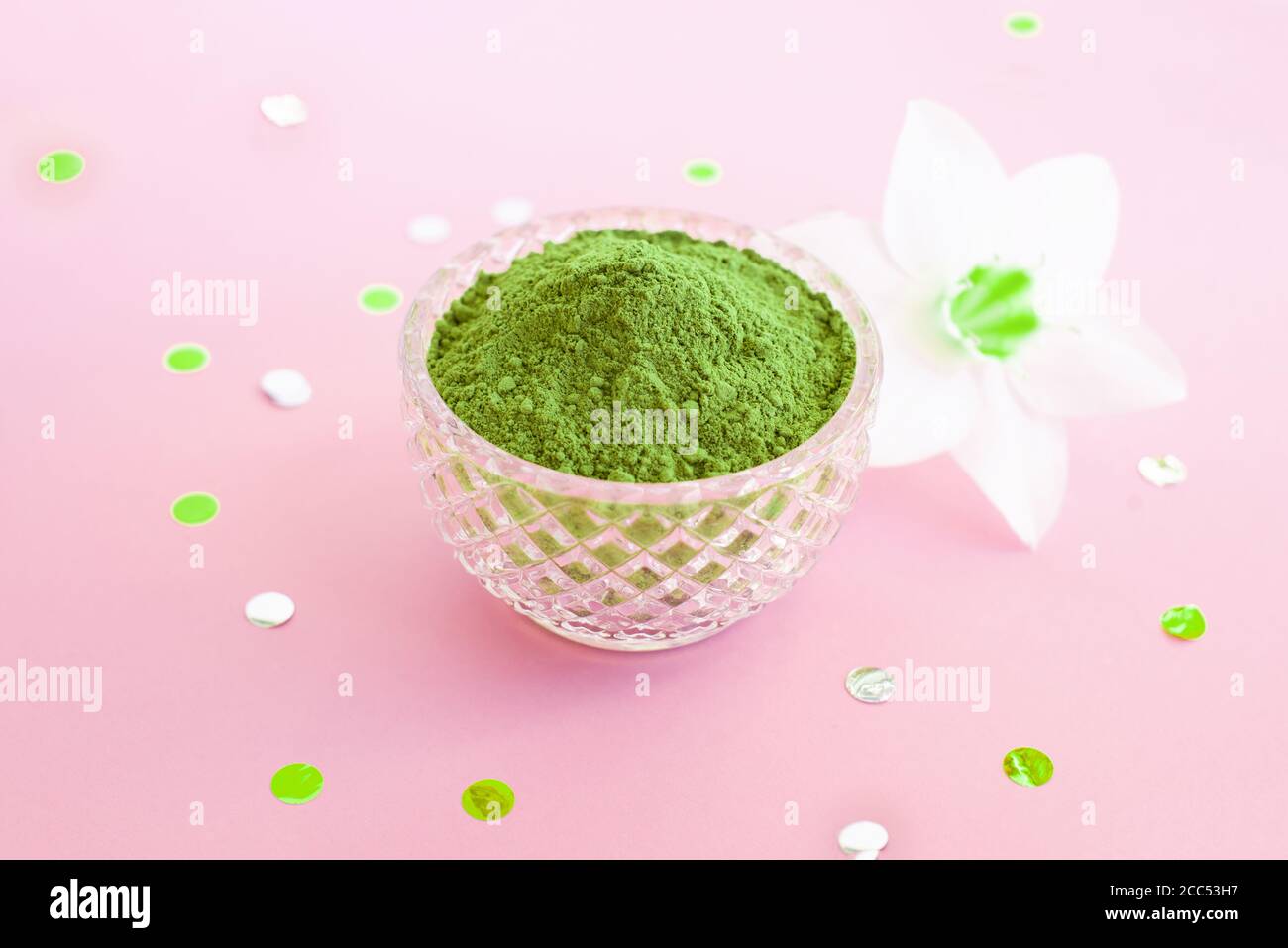 matcha dry green powder on a pink background for making Japanese ...