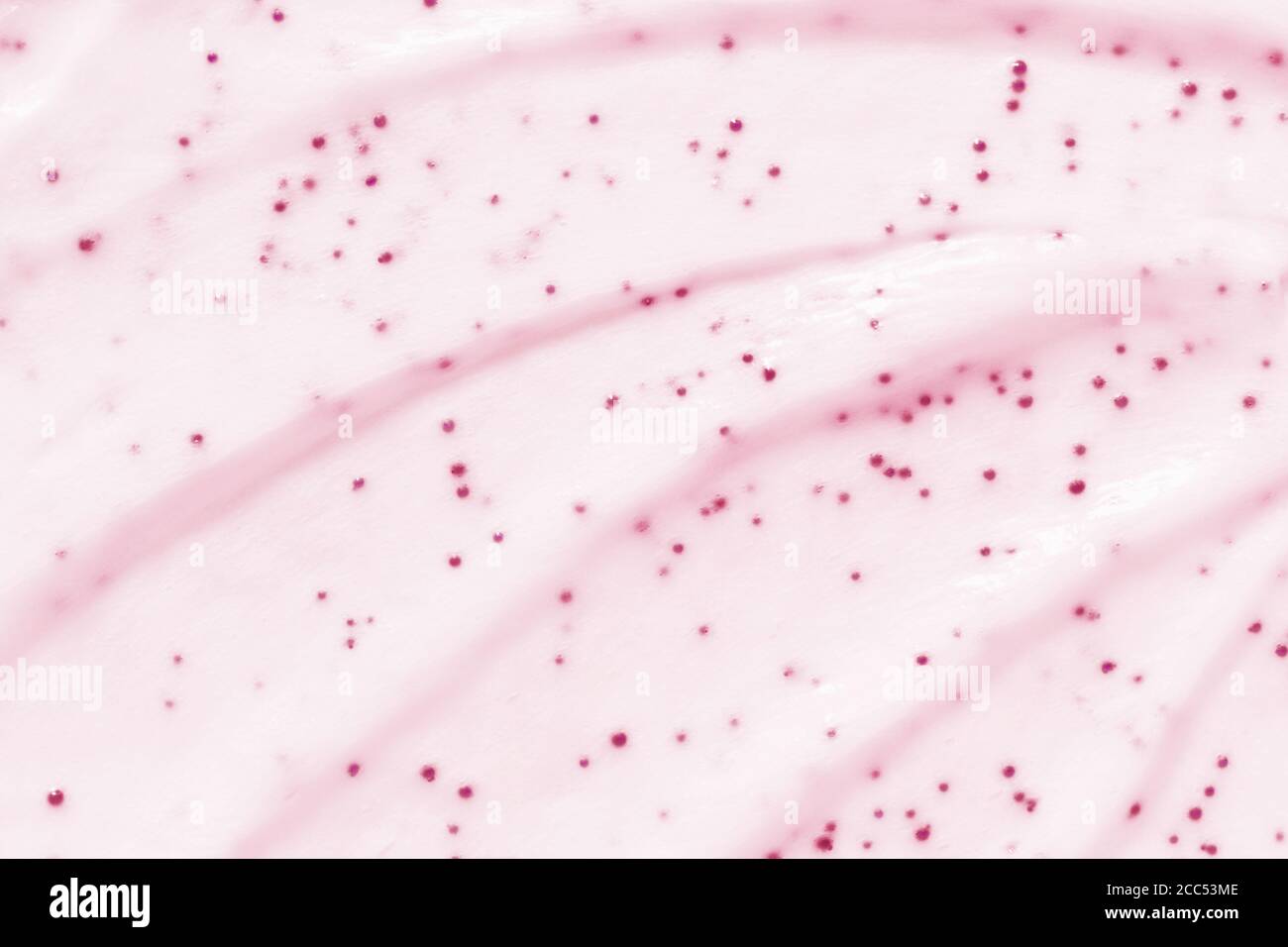 Face cream scrub texture background. Pink color exfoliating skincare ...