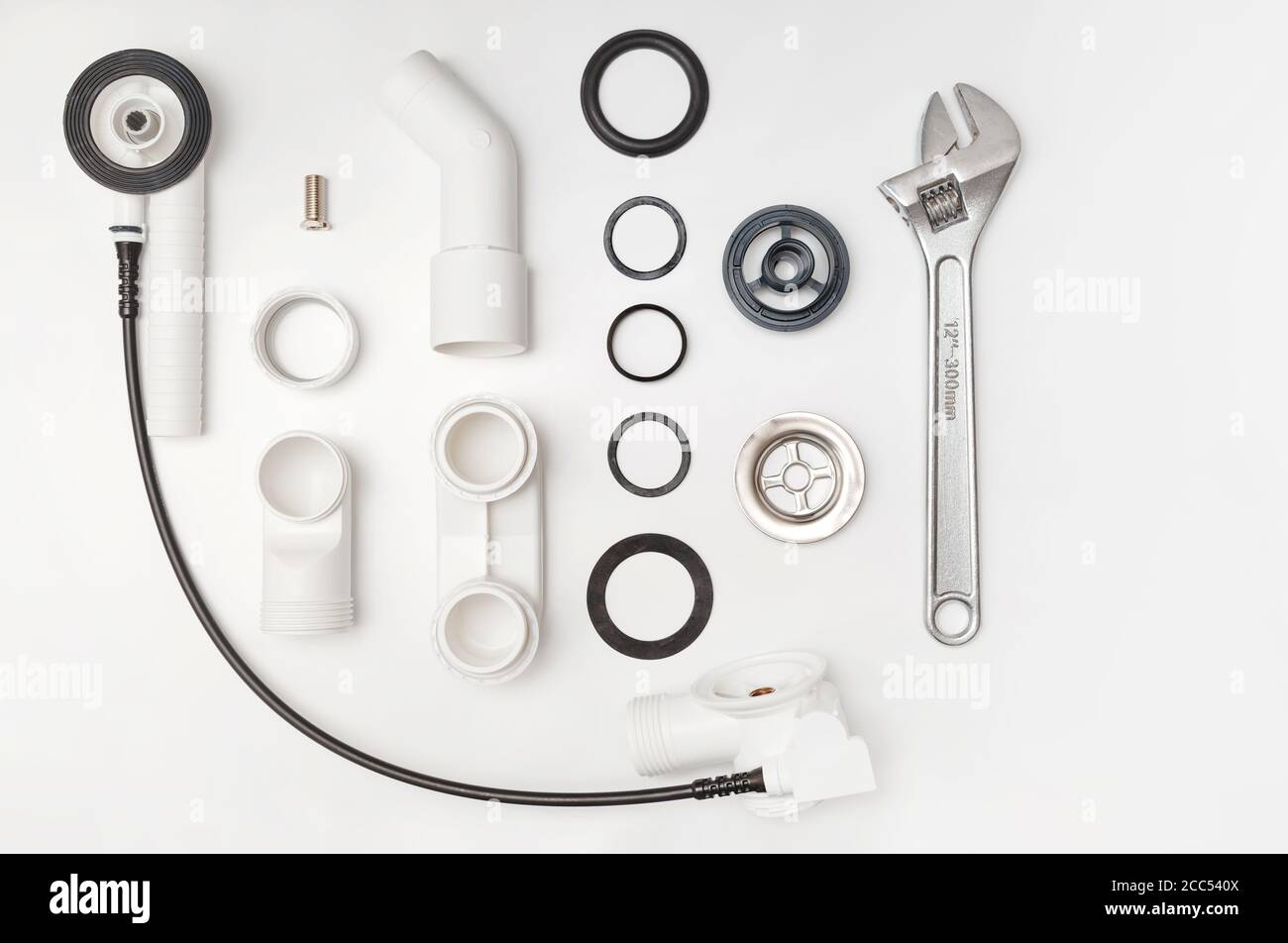 Details plastic siphon kit for bathtub on a white background. Plumbing ...