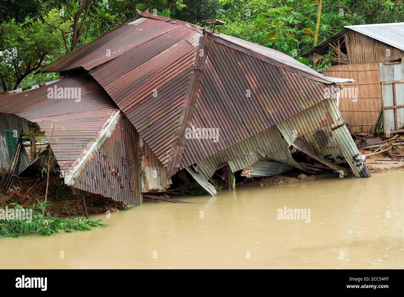 flood water over flowing on the way Stock Photo - Alamy