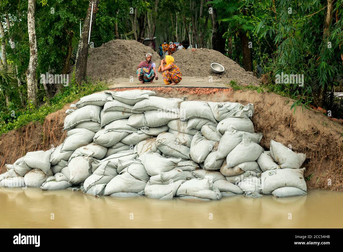 flood water over flowing on the way Stock Photo - Alamy