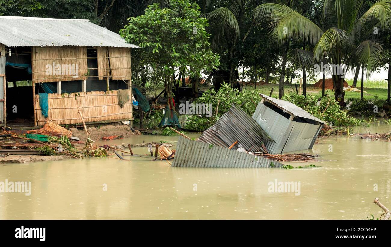 flood water over flowing on the way Stock Photo - Alamy