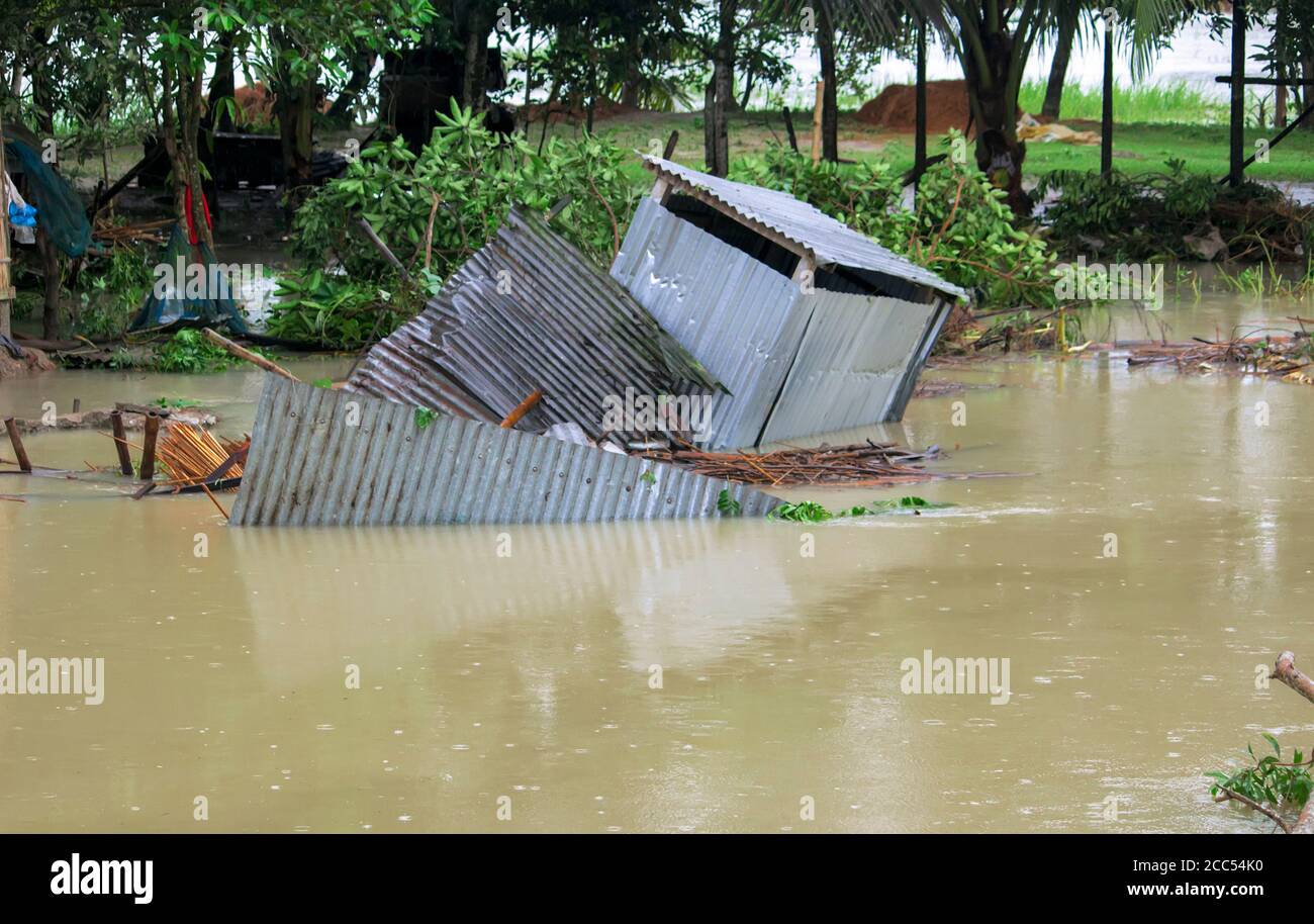 flood water over flowing on the way Stock Photo - Alamy