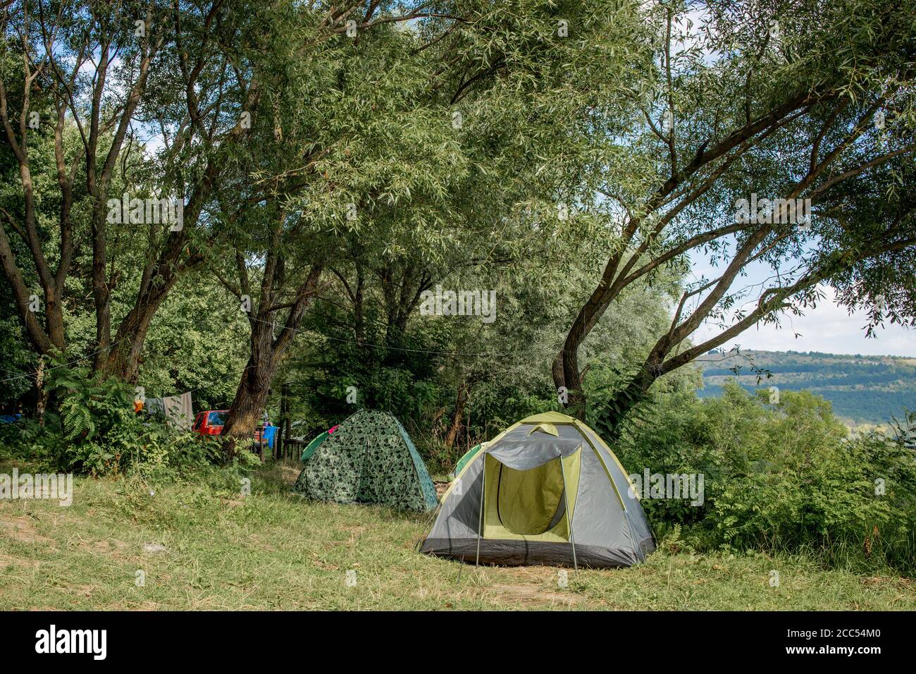 Camping Tents in Nature background view. Scenic view. Camping, tourism ...