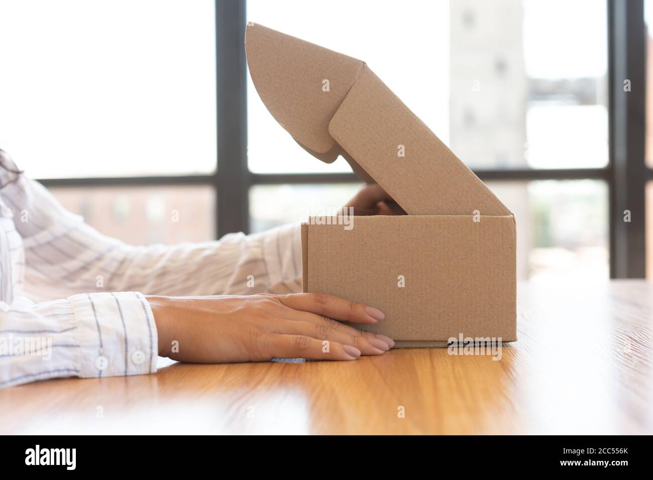 Cardboard box open lift lid hi-res stock photography and images - Alamy