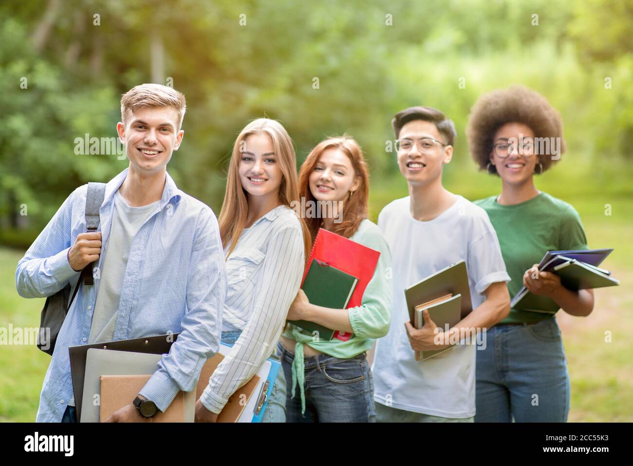 University Friends. Outdoor Portrait Of Diverse Multiracial Students ...
