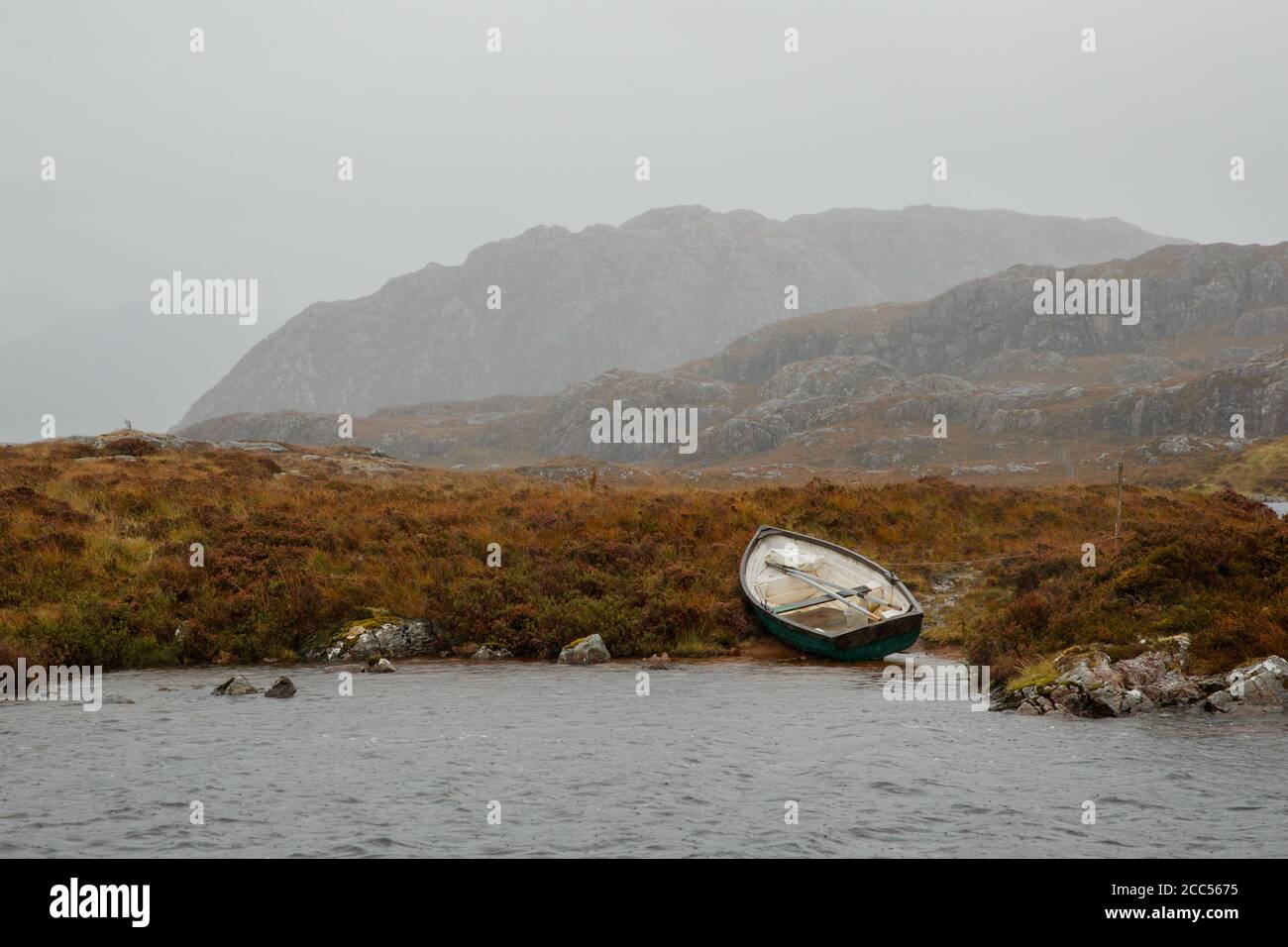 Row boat rain hi-res stock photography and images - Alamy