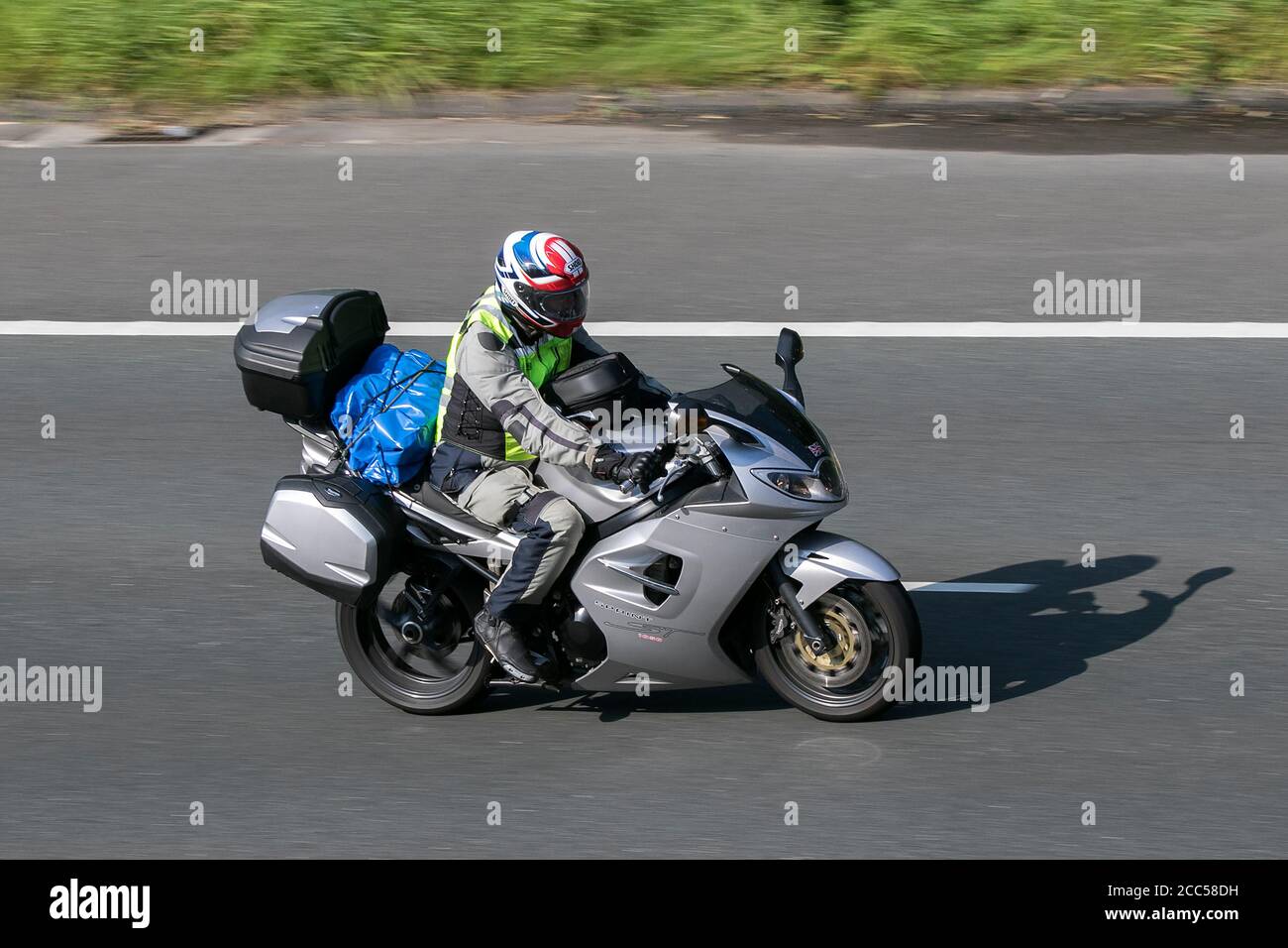 Silver Triumph Sprint Motorbike rider; two wheeled transport ...