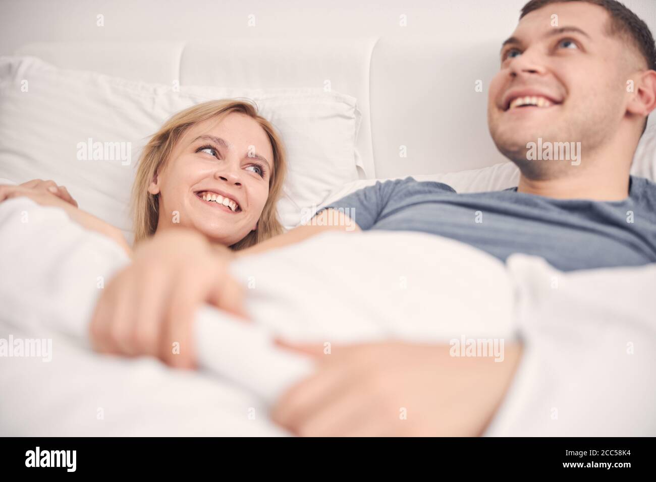 Happy young couple having nice times together Stock Photo - Alamy