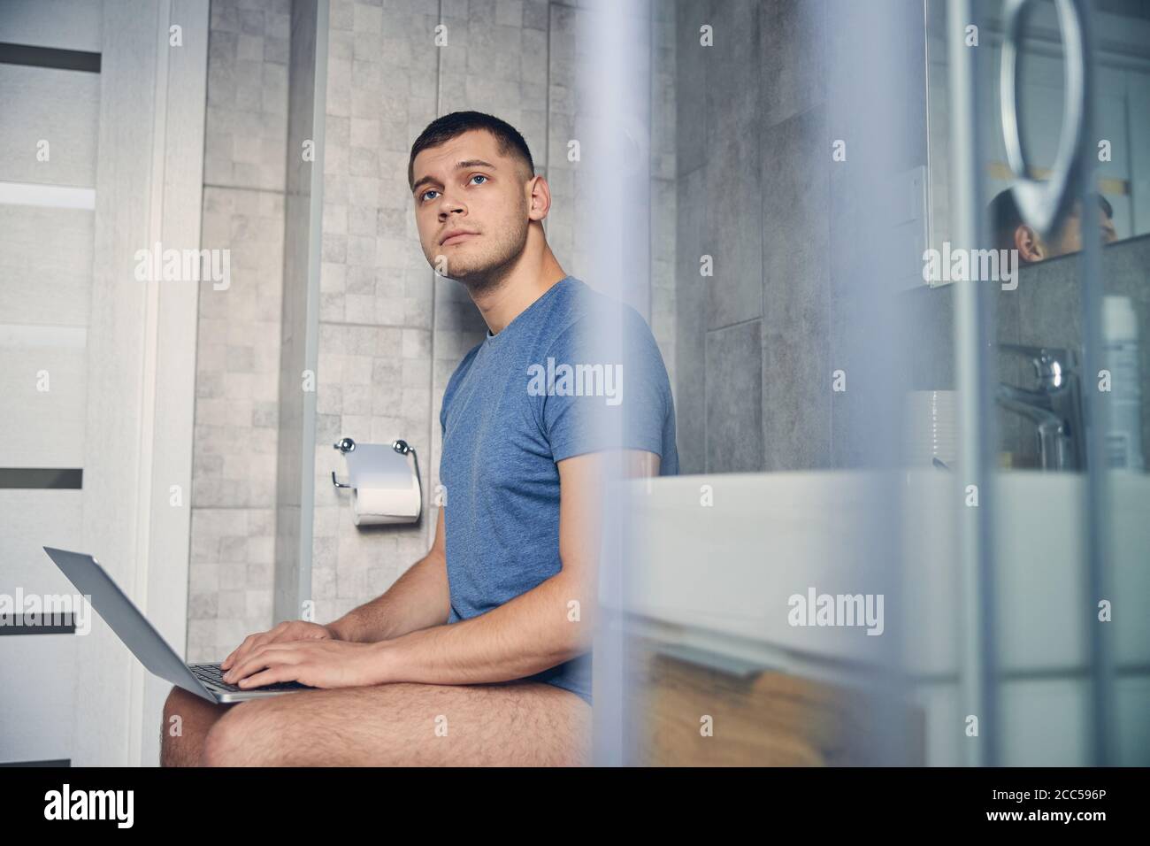 Man laptop toilet hi-res stock photography and images - Alamy