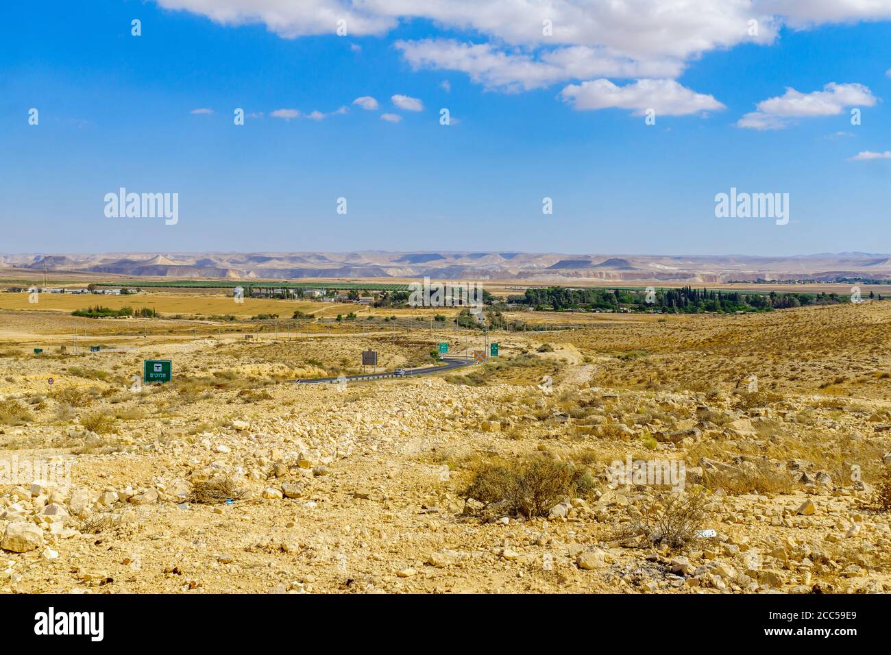 View of the Negev Desert near Sde Boker, with trilingual road signs. Southern Israel Stock Photo ...