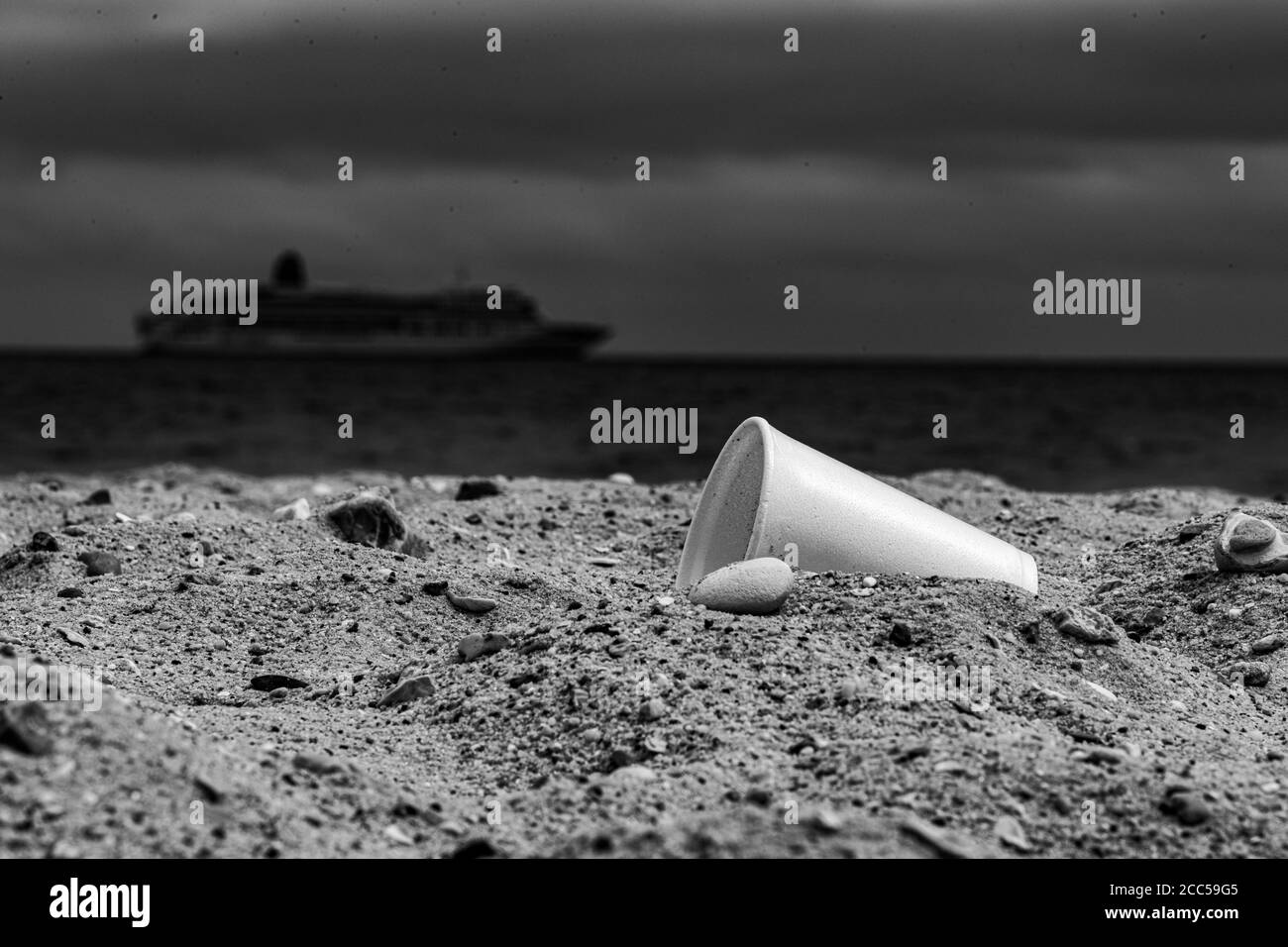 Plastic Pollution: Styrofoam Cup left by tourists on the beach. Cruise ...