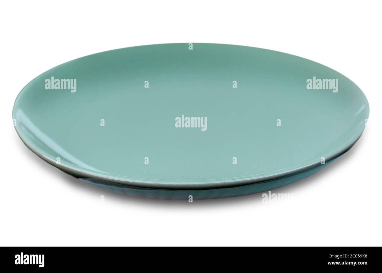 the empty green plate on white background. Selective focus Stock Photo ...
